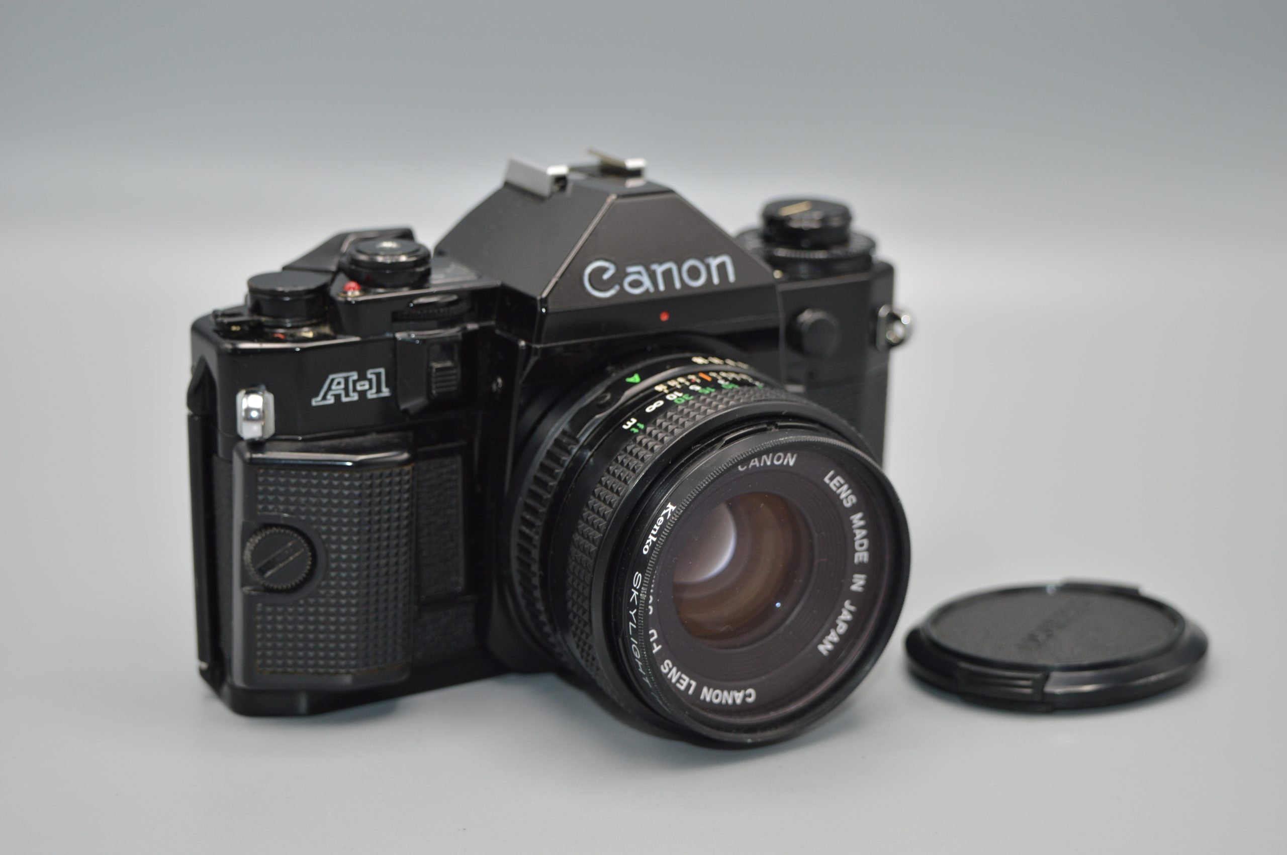 Canon Ae1 and A1 cameras with lenses – Gillani Cameras
